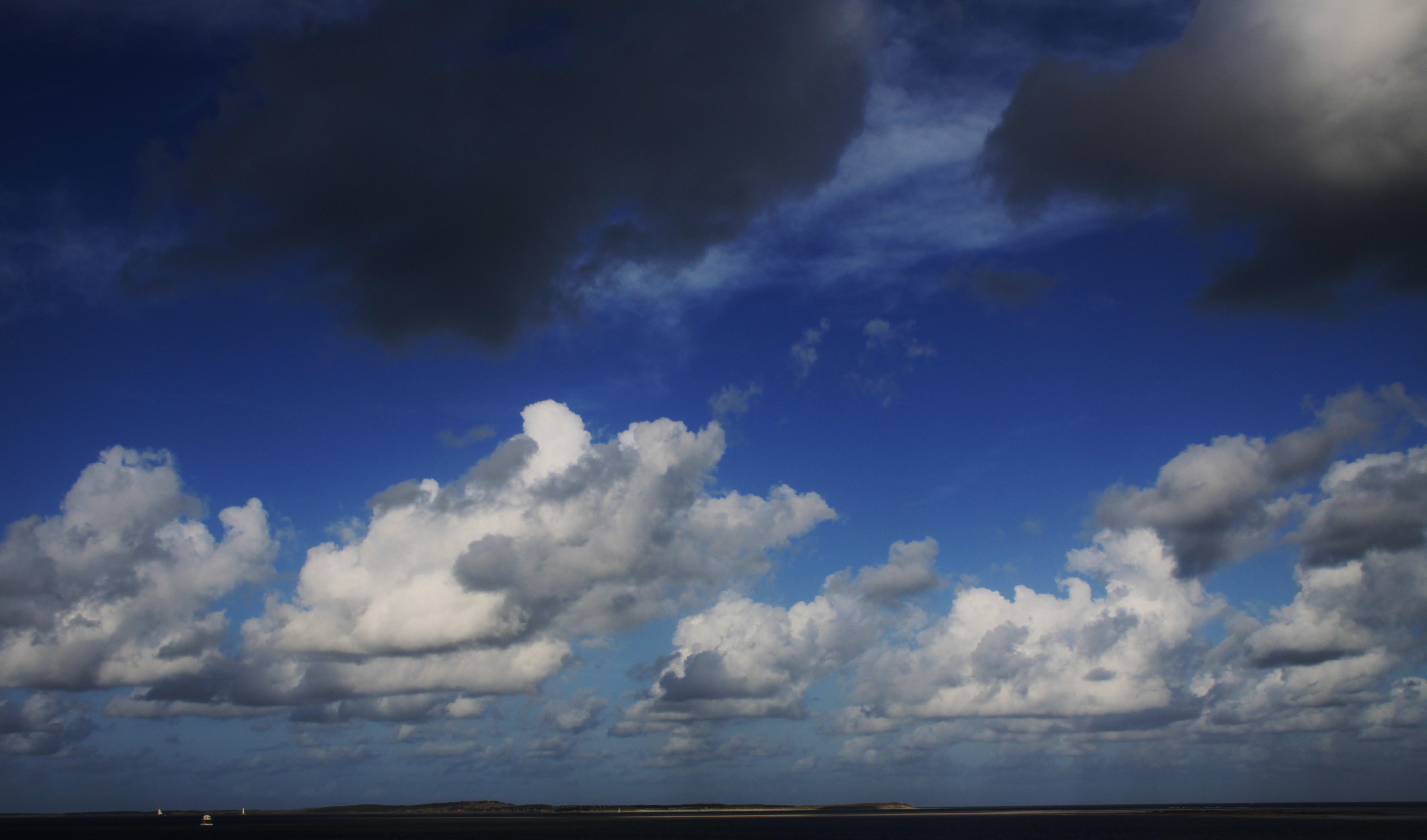 Vroege vogels Foto - Weer en landschap - Vlieland en wolkenlucht